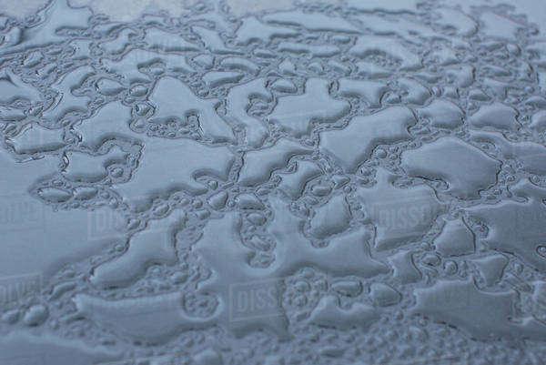 Wet metal surface - Royalty-free Stock Photo | Dissolve