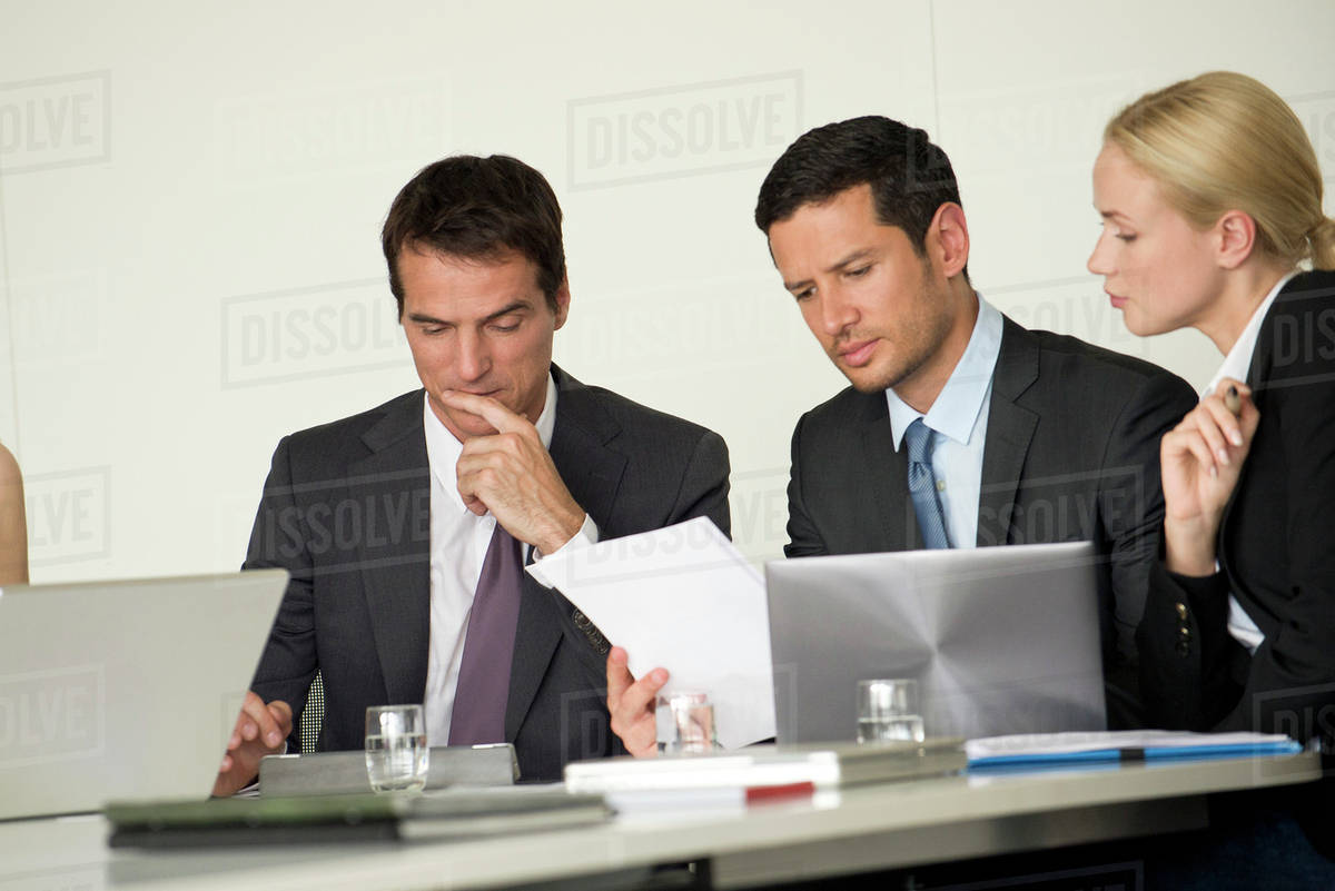 Executives in meeting - Stock Photo - Dissolve