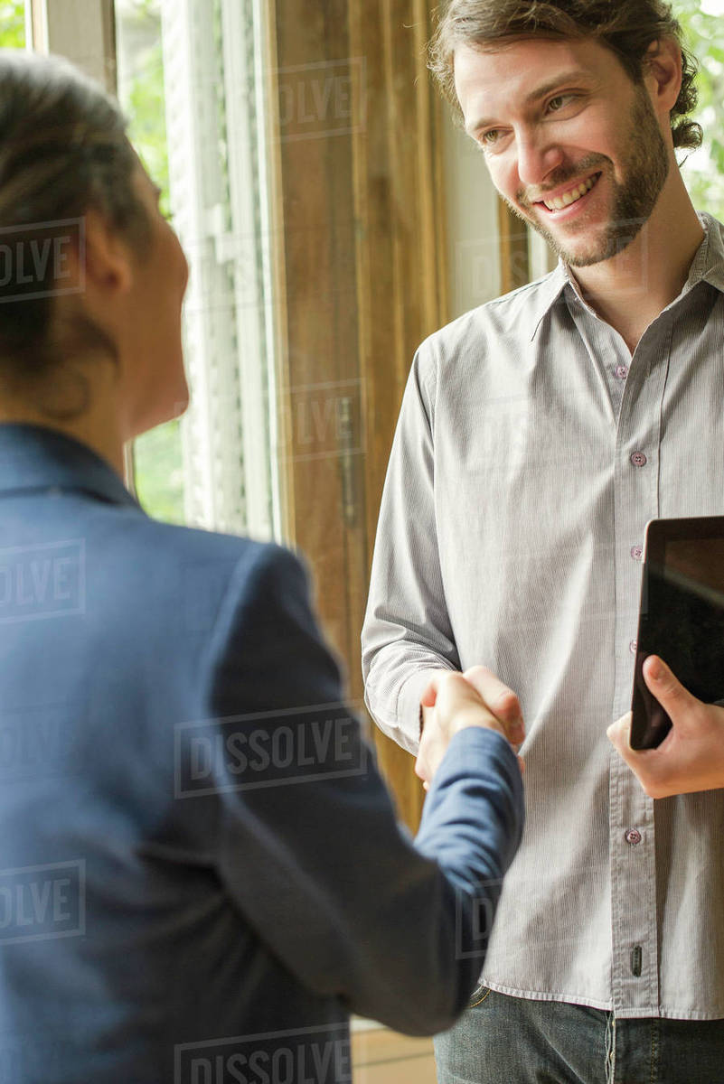 Client shaking hands with sales person - Royalty-free Stock Photo ...
