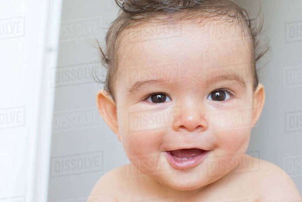 Baby smiling, portrait - Royalty-free Stock Photo | Dissolve