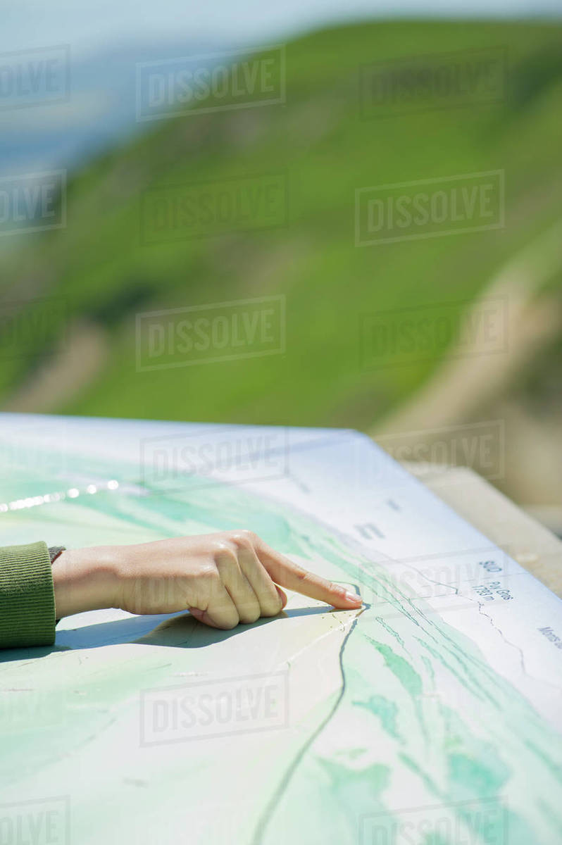 Child's hand touching map at scenic overlook - Royalty-free Stock Photo ...