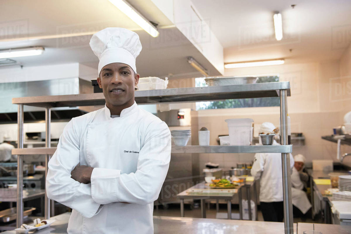 Chef in commercial kitchen, portrait - Royalty-free Stock Photo | Dissolve