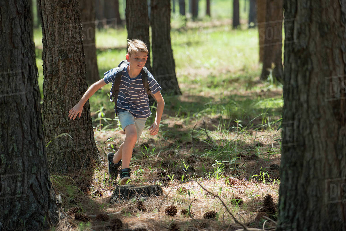 Guy Running Through Woods