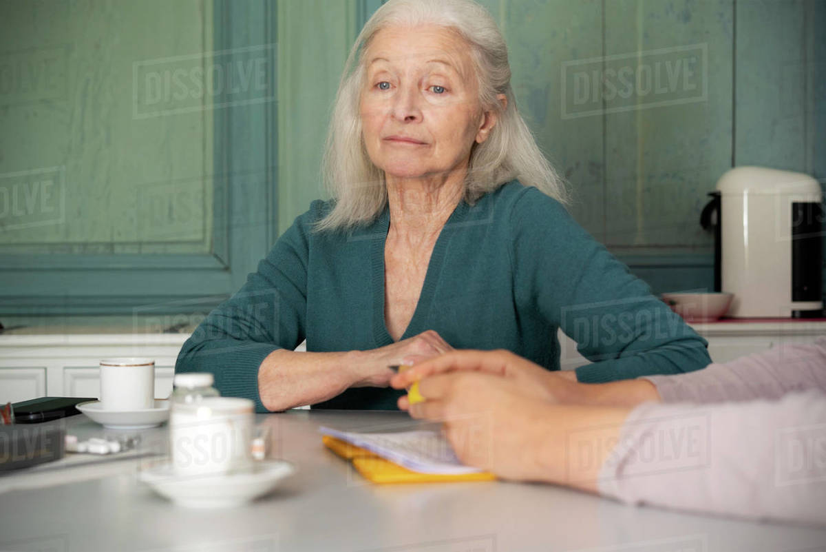 Sad patient sitting in clinic - Royalty-free Stock Photo | Dissolve