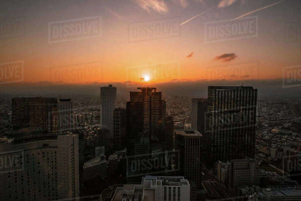View of modern skyscrapers at sunset - Royalty-free Stock Photo | Dissolve