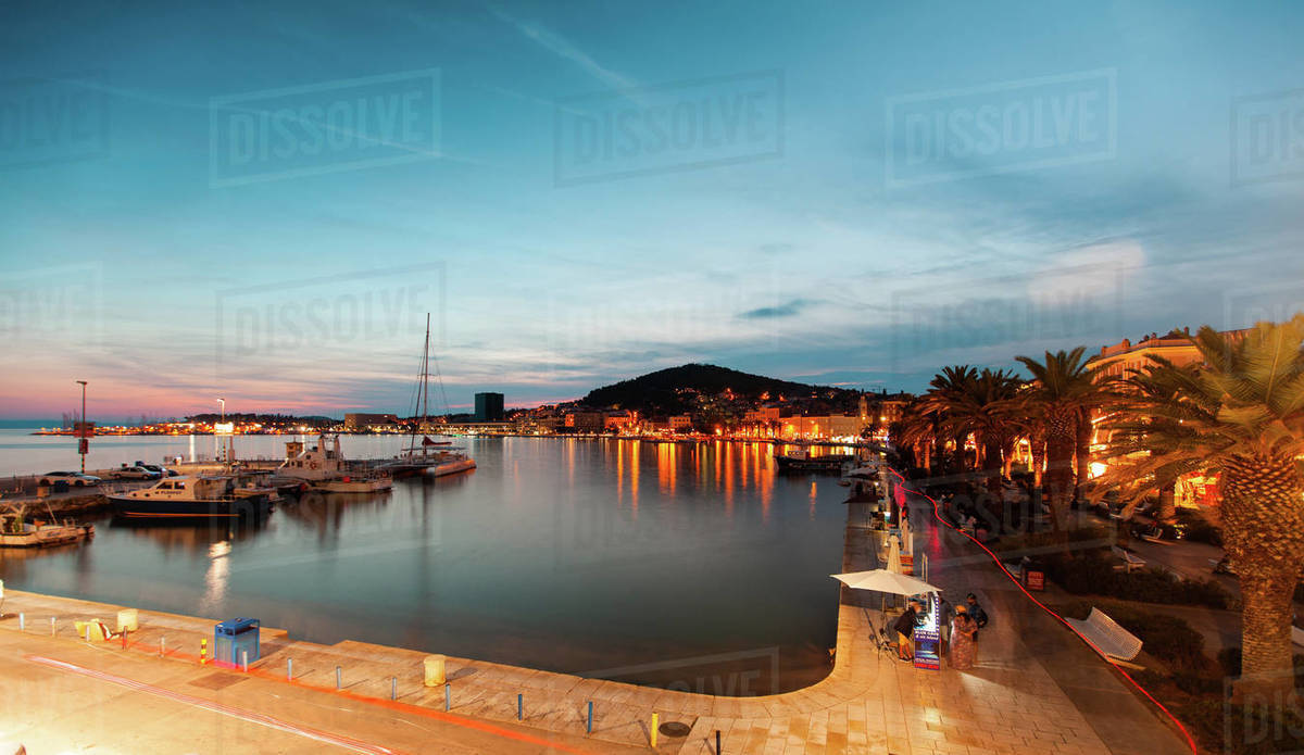 Seaside promenade at dusk - Royalty-free Stock Photo | Dissolve