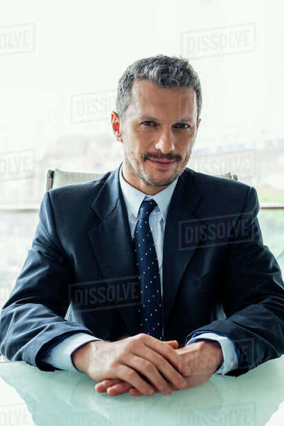 Portrait of businessman in office - Royalty-free Stock Photo | Dissolve