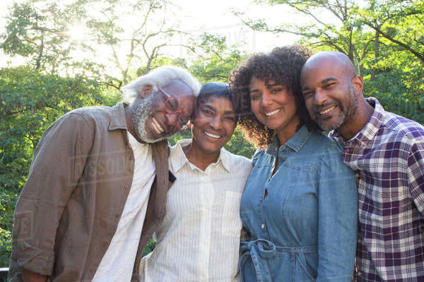 Happy multi-generation family standing in balcony - Royalty-free Stock ...