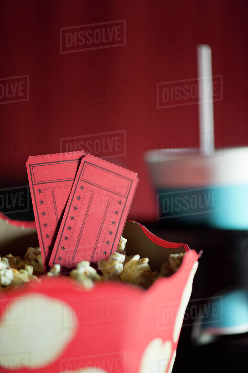 Movie tickets and popcorn - Royalty-free Stock Photo | Dissolve