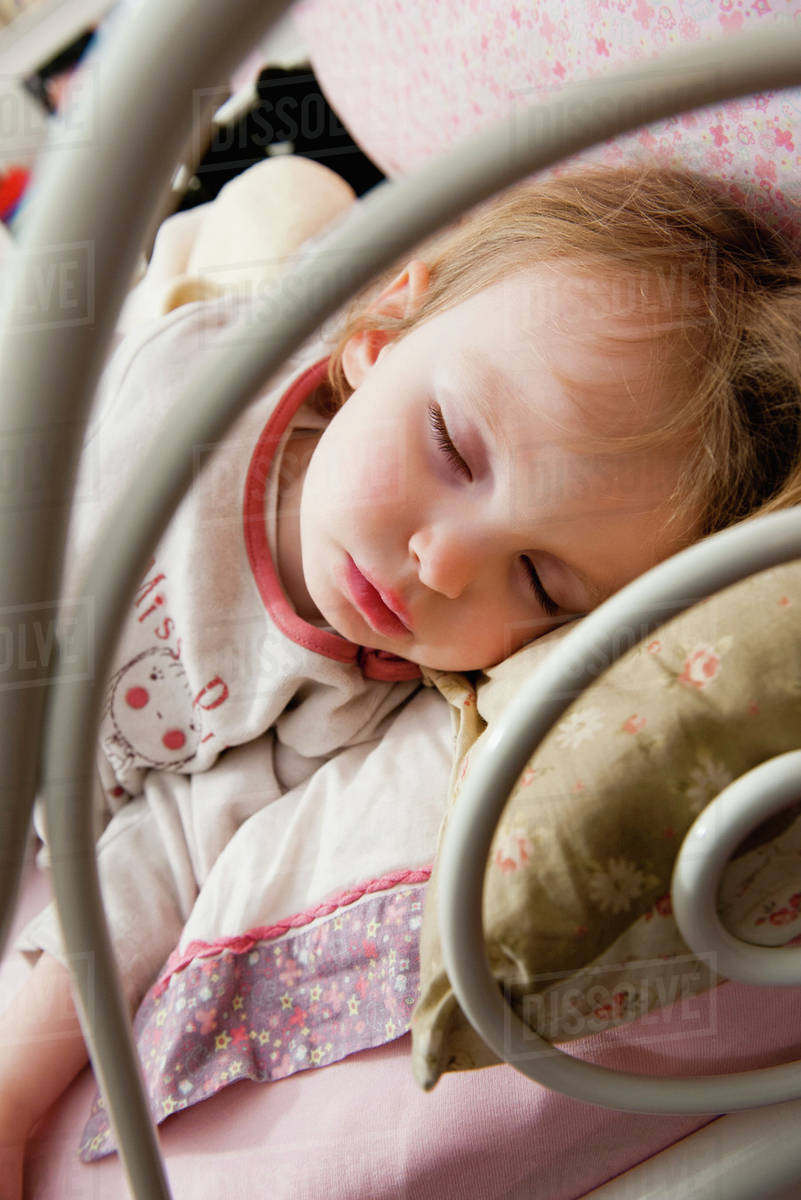Little girl napping, close-up - Royalty-free Stock Photo | Dissolve