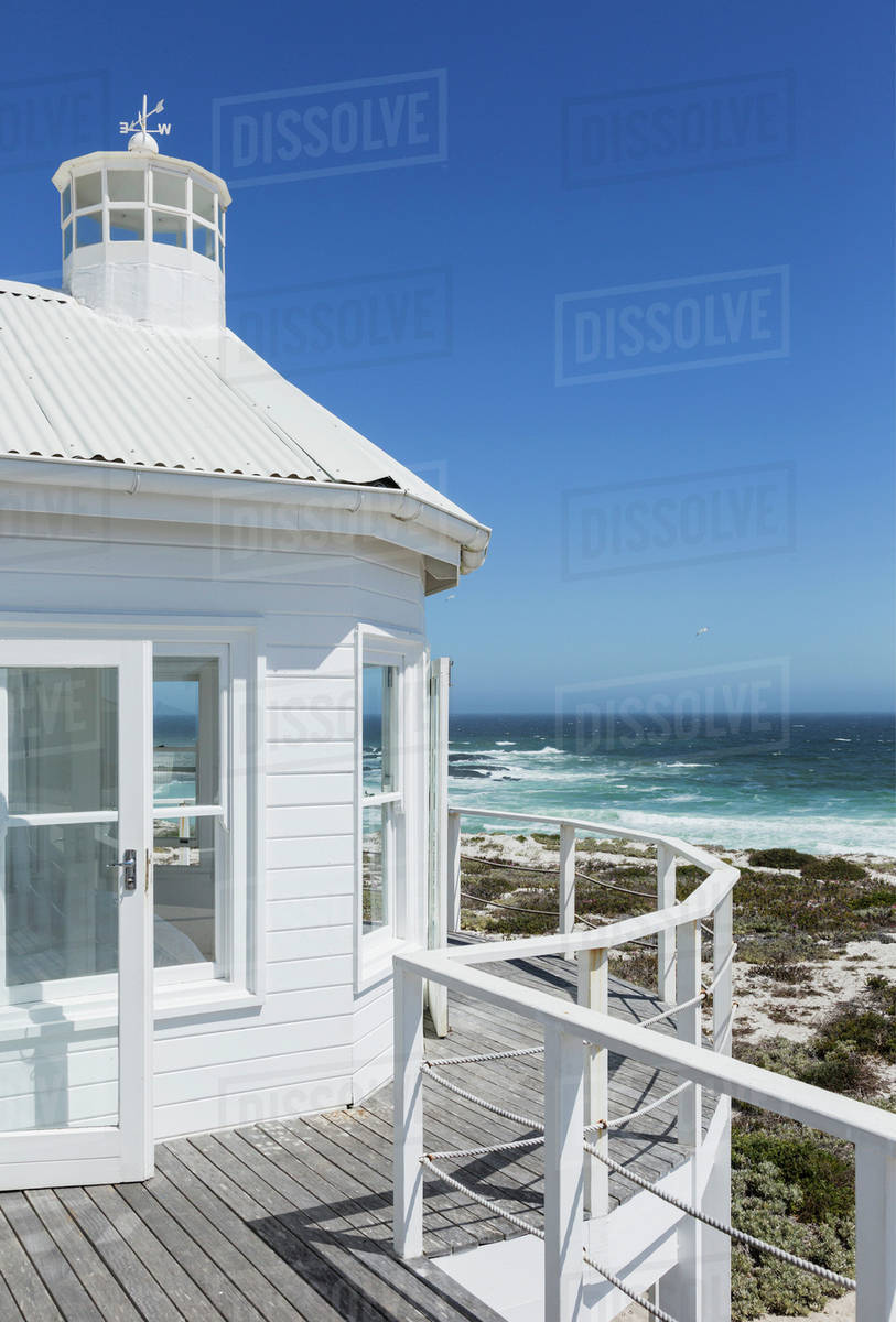 Beach house overlooking ocean - Royalty-free Stock Photo | Dissolve