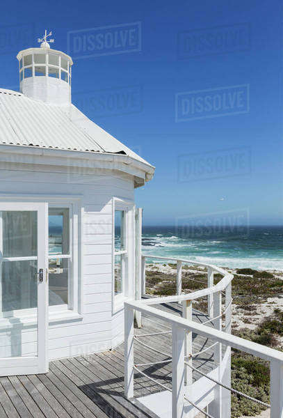 Beach house overlooking ocean - Royalty-free Stock Photo | Dissolve