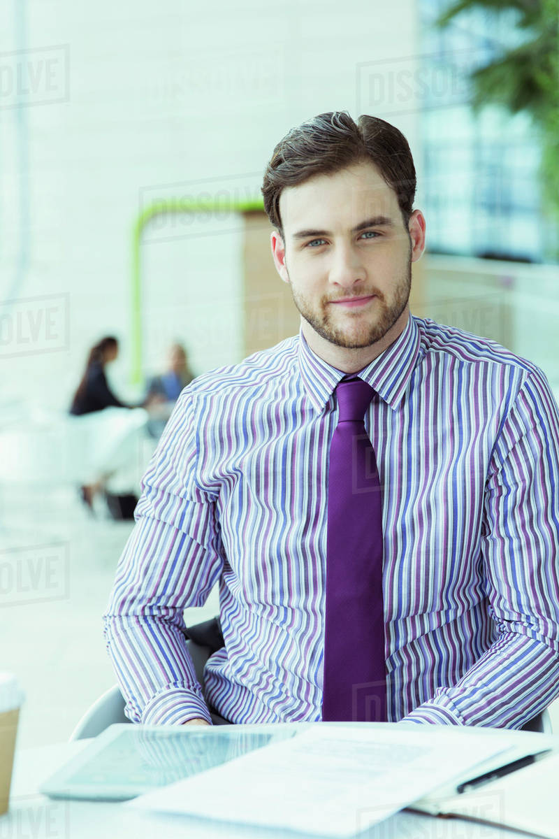 Businessman sitting in office - Royalty-free Stock Photo | Dissolve