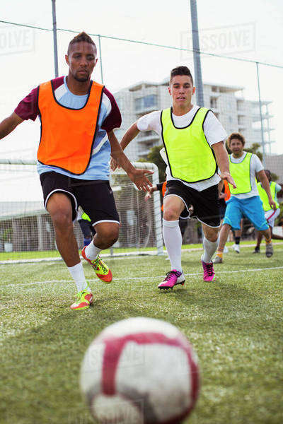 Soccer players training on field - Royalty-free Stock Photo | Dissolve