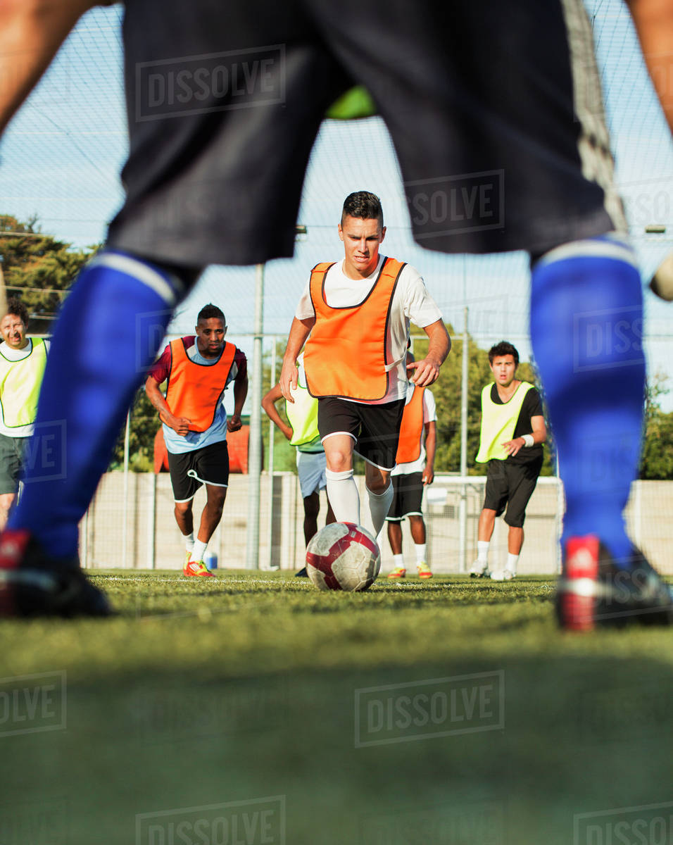 Soccer players training on field - Royalty-free Stock Photo | Dissolve