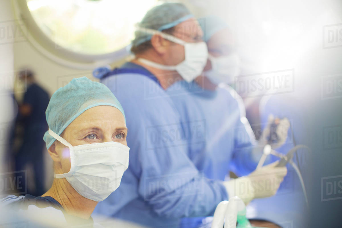 Portrait of female anesthesiologist in operating theater - Stock Photo ...