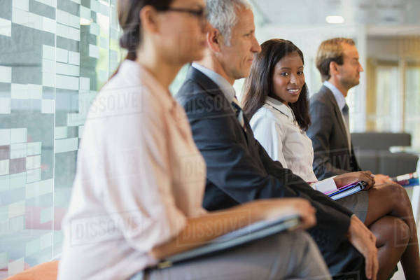 Business people sitting in office together - Royalty-free Stock Photo ...