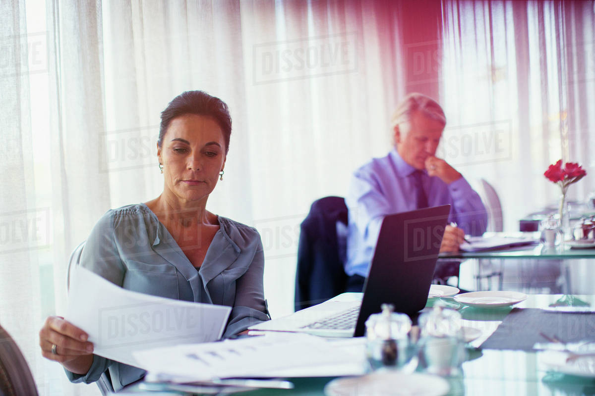 Business woman and business man working in restaurant - Stock Photo ...