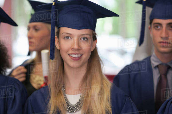 Female student in graduation clothes smiling at camera - Stock Photo ...