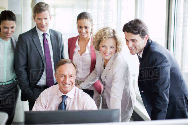 Business people using computer in office - Royalty-free Stock Photo ...
