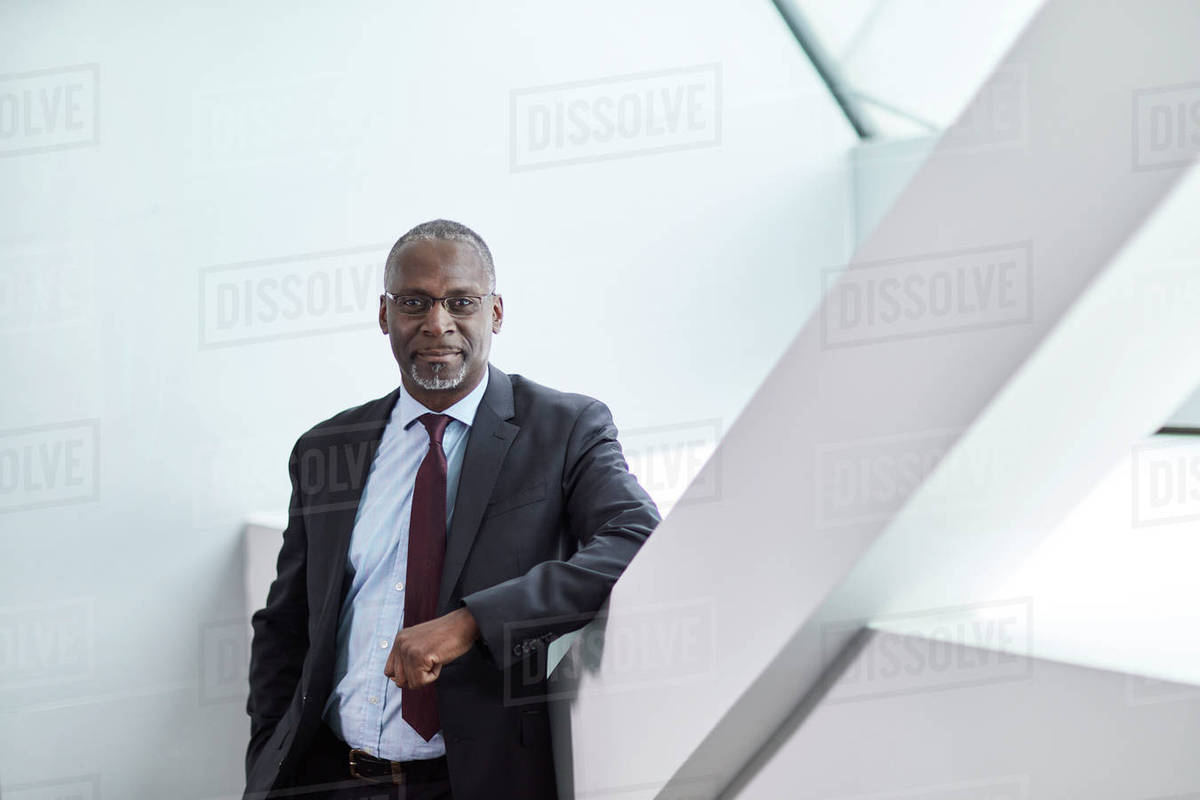 Portrait serious businessman - Stock Photo - Dissolve