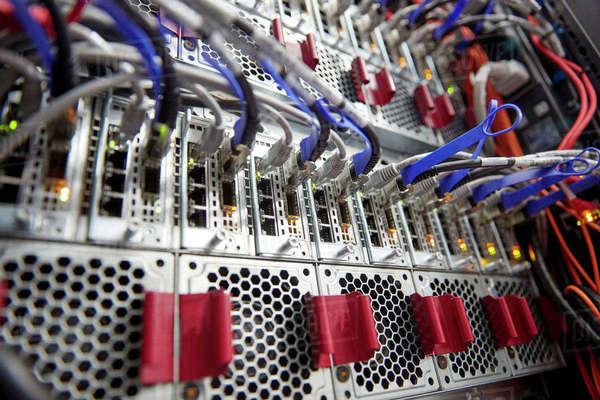 Close up server panels and network connection plug - Stock Photo - Dissolve