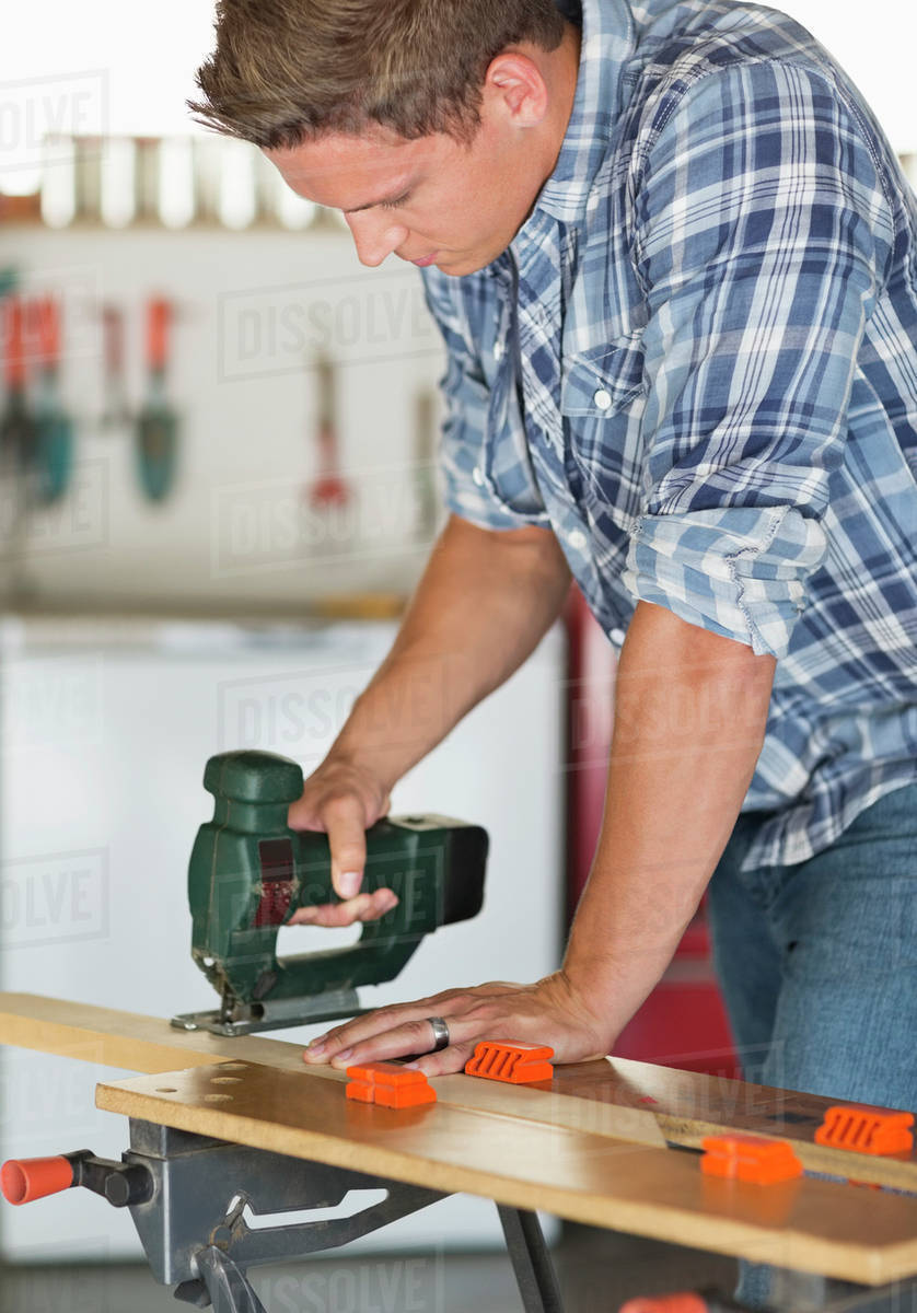 Man working in workshop - Royalty-free Stock Photo | Dissolve