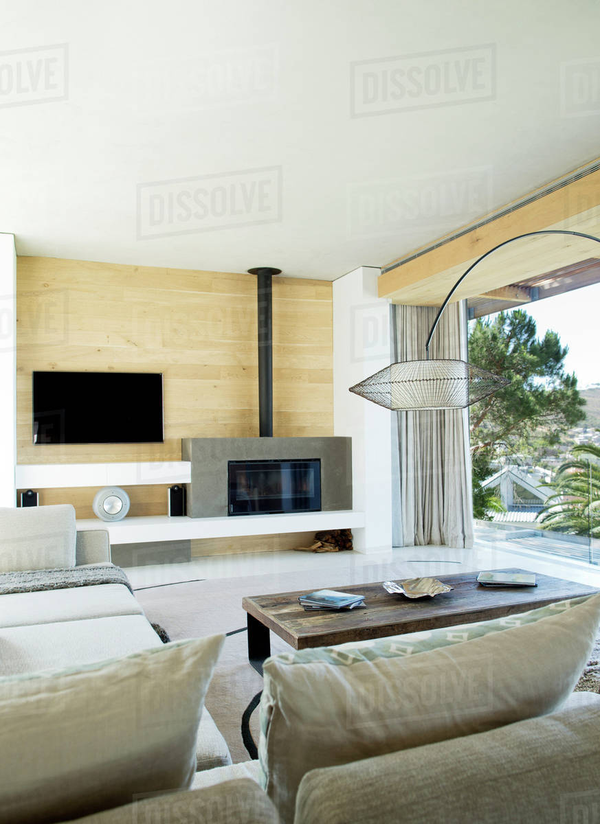 Sofas and table in modern living room - Royalty-free Stock Photo | Dissolve