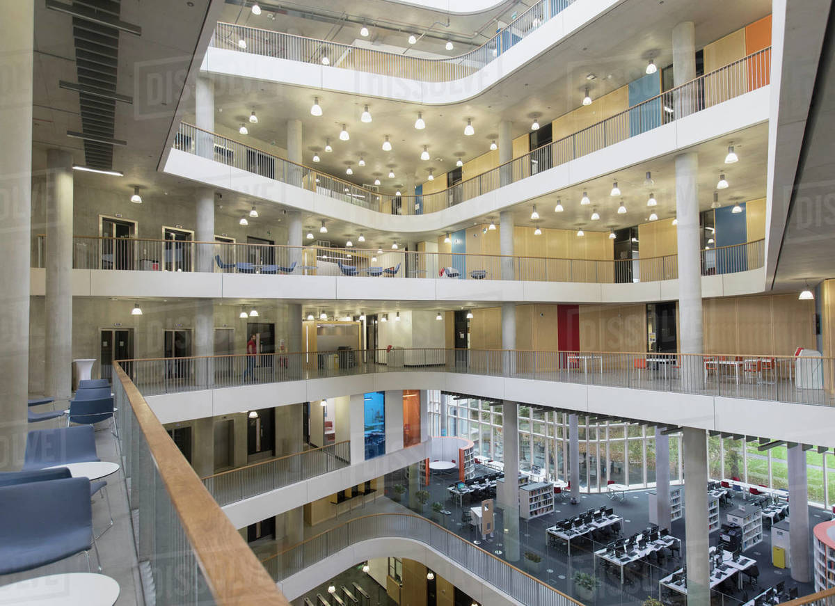 Modern office atrium with balconies - Royalty-free Stock Photo | Dissolve