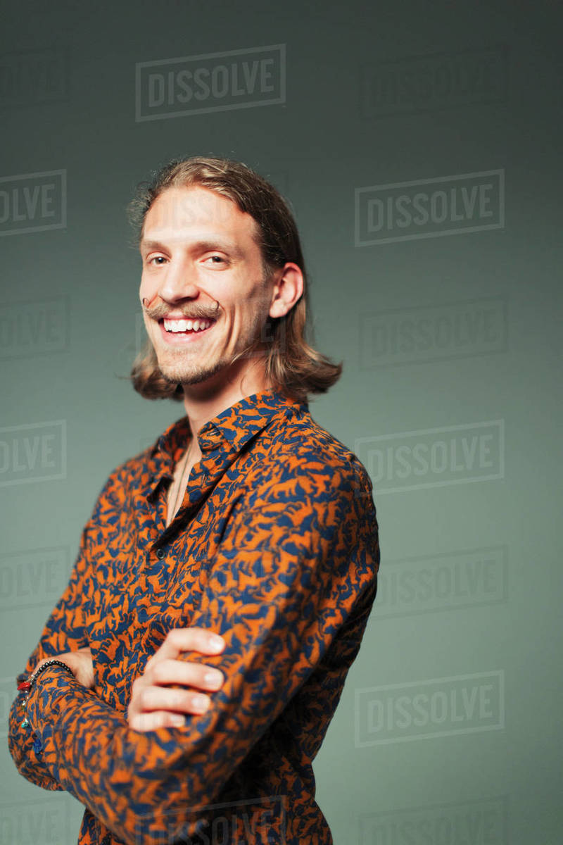 Portrait smiling, confident young man with handlebar mustache - Royalty ...