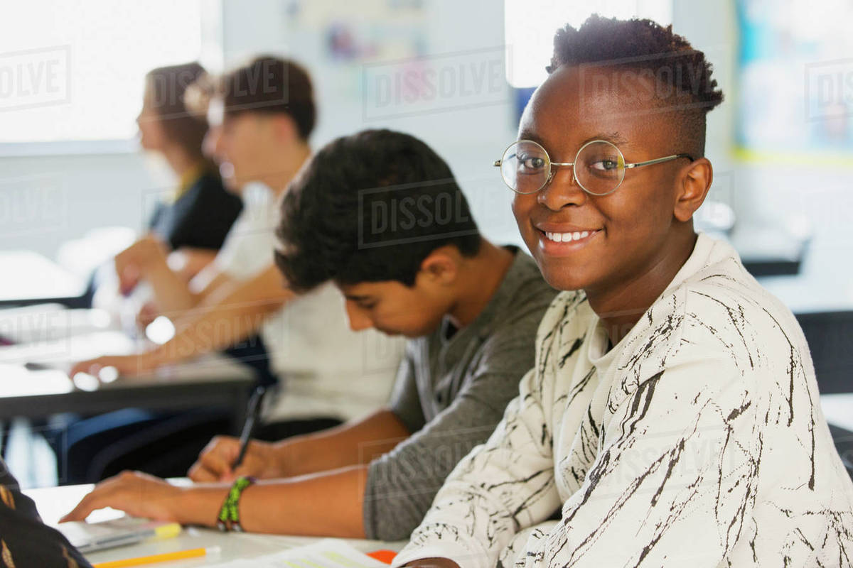 Portrait confident high school boy student in classroom - Stock Photo ...