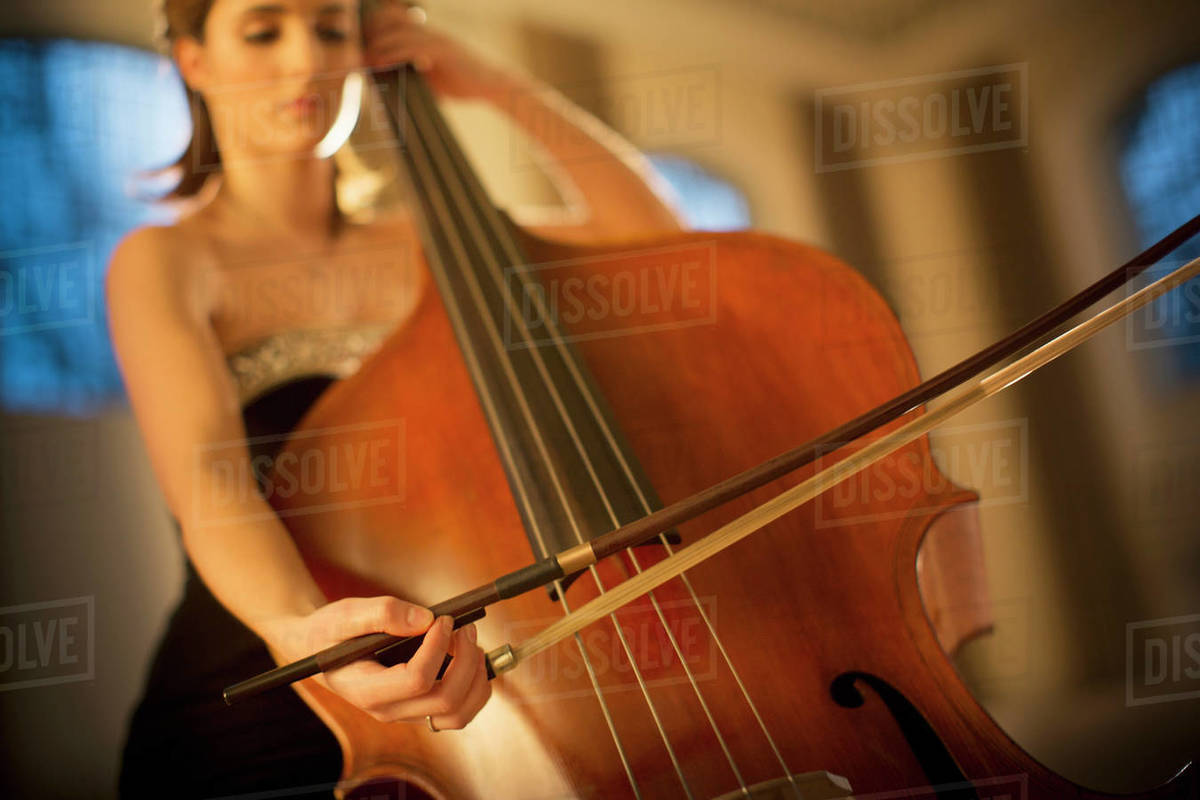 Double bassist performing - Royalty-free Stock Photo | Dissolve