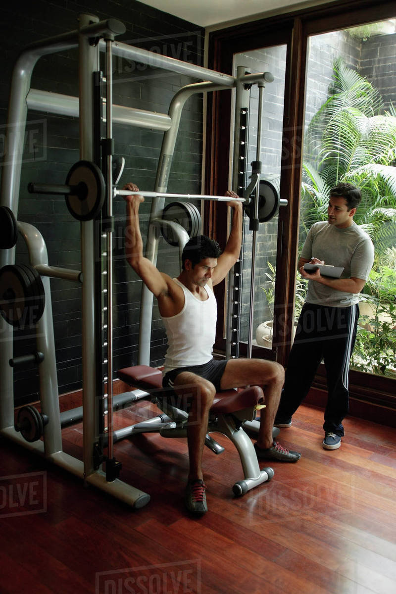 Two men working out - Stock Photo - Dissolve