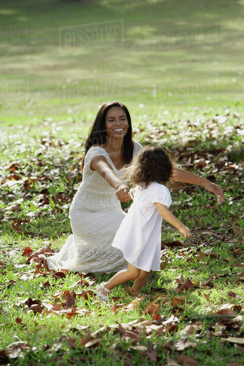 Child running to mother - Royalty-free Stock Photo | Dissolve