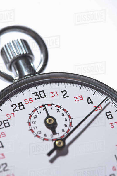 A moving stopwatch, close-up - Stock Photo - Dissolve