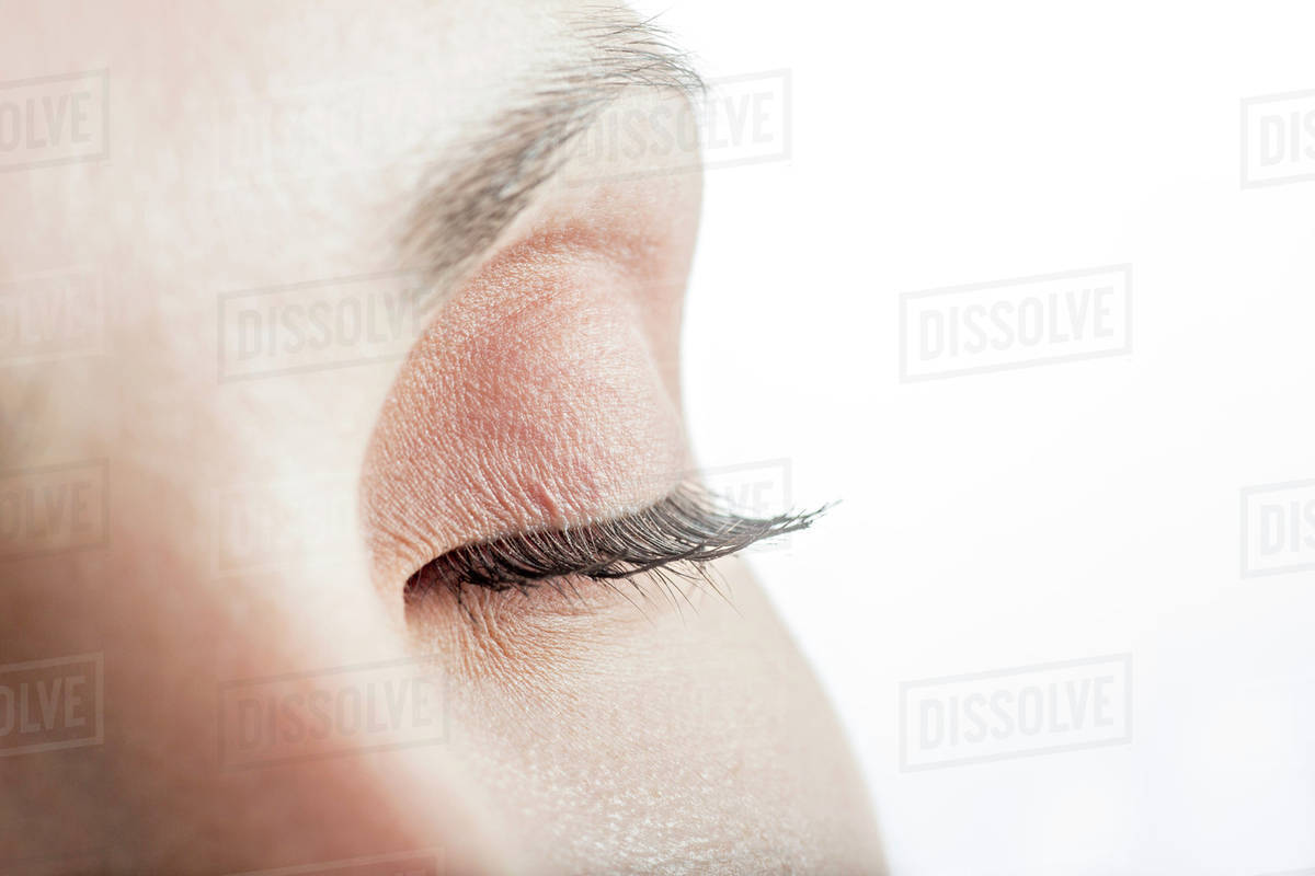 Close up of woman's closed eye - Royalty-free Stock Photo | Dissolve