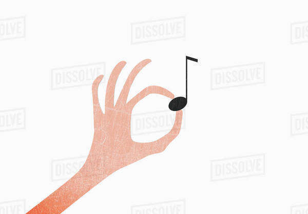 Hand holding musical note against white background - Stock Photo - Dissolve