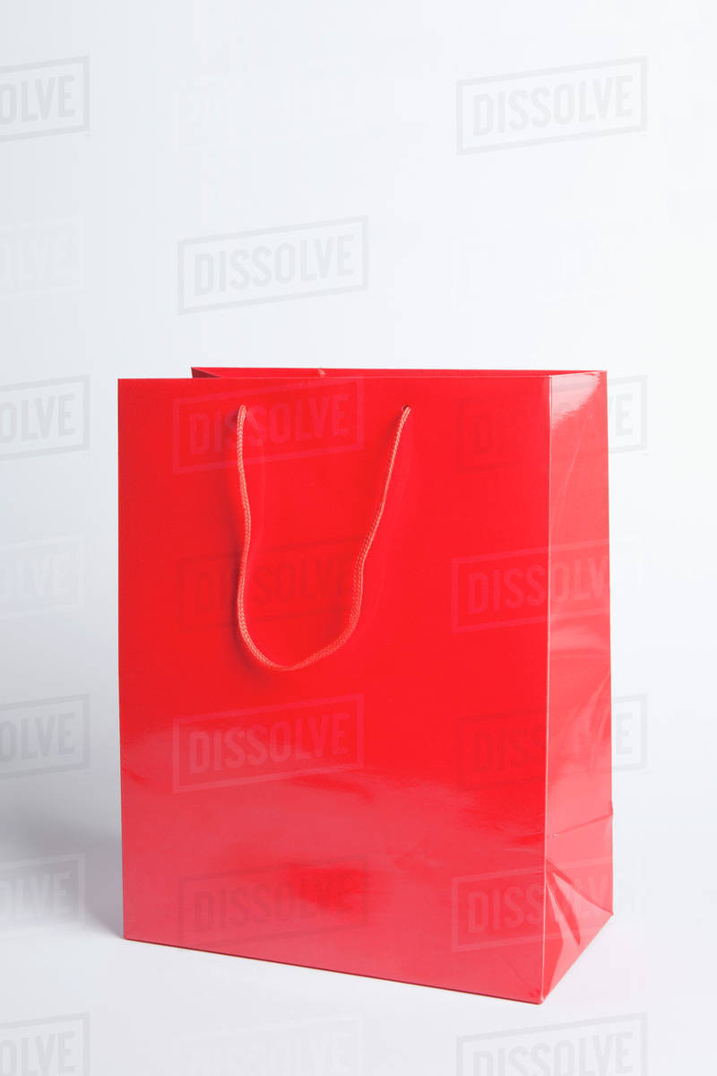Red shopping bag - Stock Photo - Dissolve