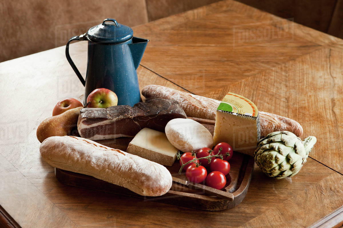 A simple rustic meal on a wood table - Royalty-free Stock Photo | Dissolve