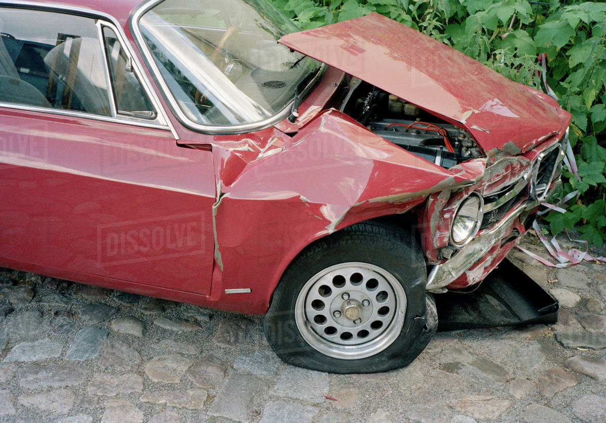 Detail of a crushed car - Stock Photo - Dissolve