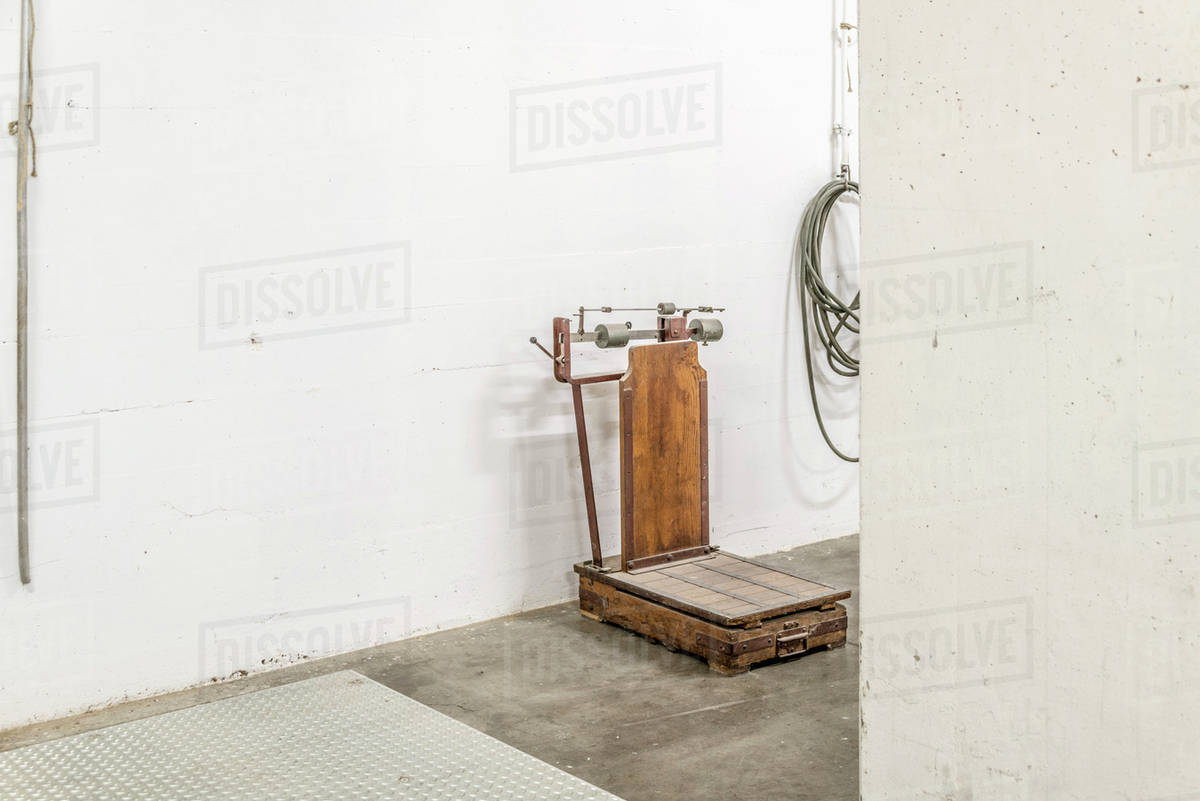 Old-fashioned weight scale against white background - Stock Photo ...