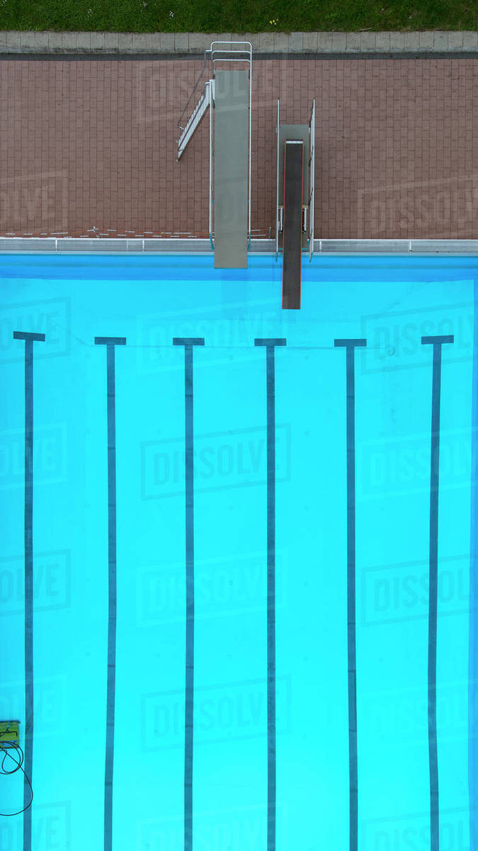 Directly above view of diving boards by swimming pool - Royalty-free ...