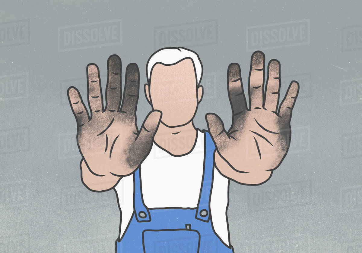 Manual worker showing messy hands while standing against gray ...