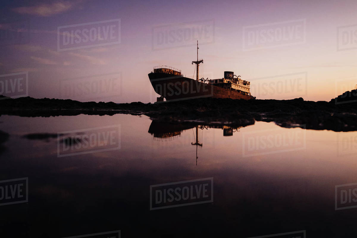 Stranded boat, Costa Teguise, Canary Islands, Spain - Stock Photo ...