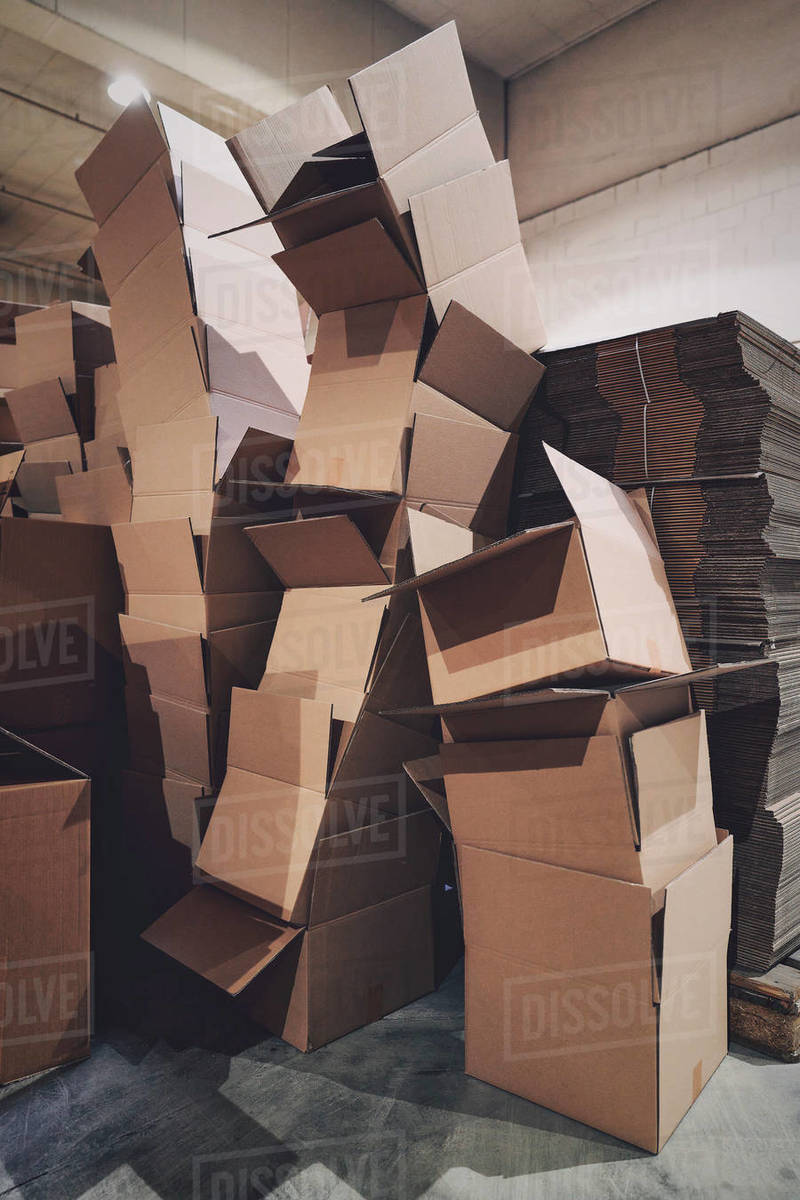 Stacked empty cardboard boxes - Royalty-free Stock Photo | Dissolve