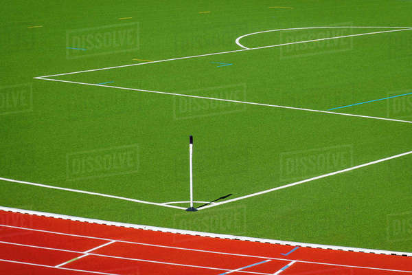 Corner post on sunny green soccer pitch - Royalty-free Stock Photo ...
