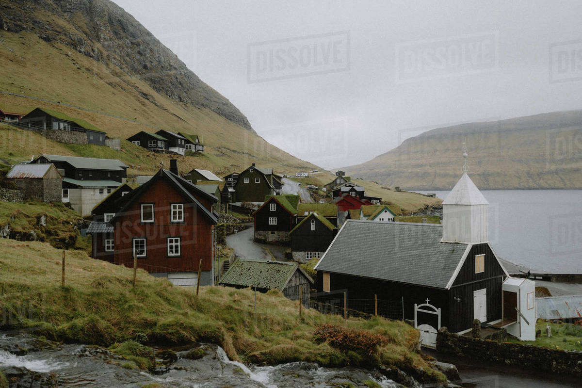Church and houses in idyllic, remote fishing village, Bour, Vagar ...