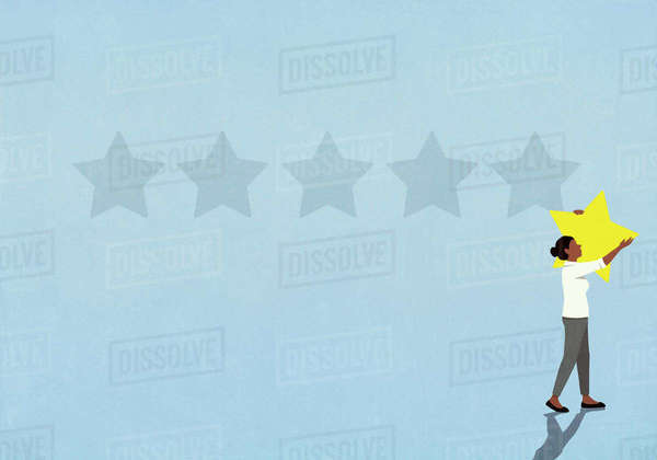 Woman removing rating star from blue background - Stock Photo - Dissolve