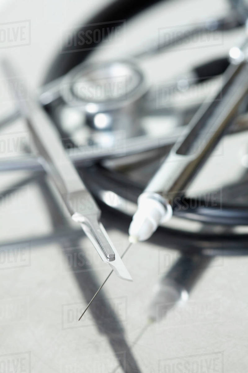 Close up of a Surgical Scalpel and Hypodermic Needle - Royalty-free ...