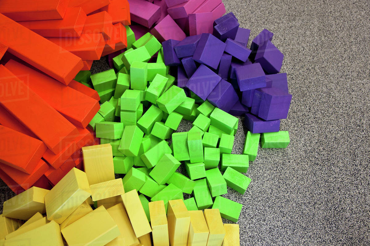 Pile of colored wooden blocks - Royalty-free Stock Photo | Dissolve
